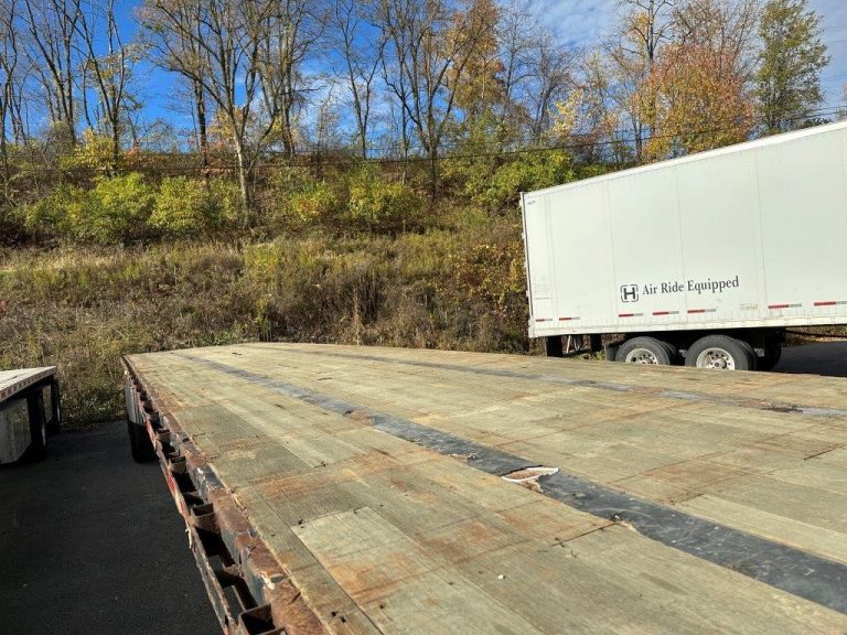 2014 MANAC 48' STEEL FLATBED W/ SLIDING TANDEM - Reno's Trailer Sales